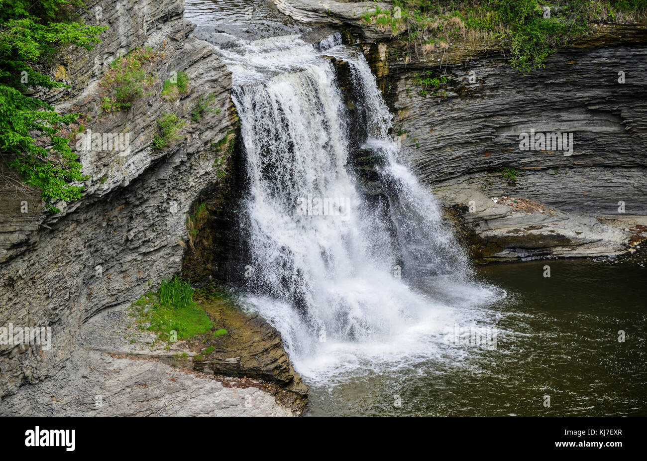 Triphammer Falls, Ithaca, New York. An urban waterfall in the middle of ...