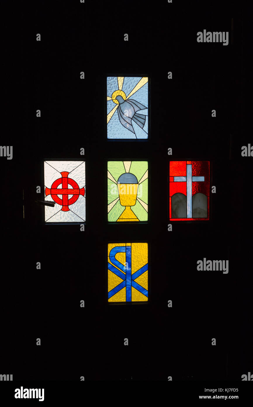 Stained-glass windows on door. San Vittore Martire Church (Church of ...