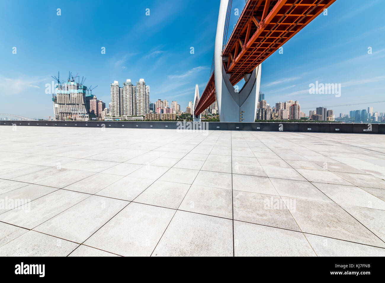 Panoramic skyline and buildings with empty concrete square floor ...