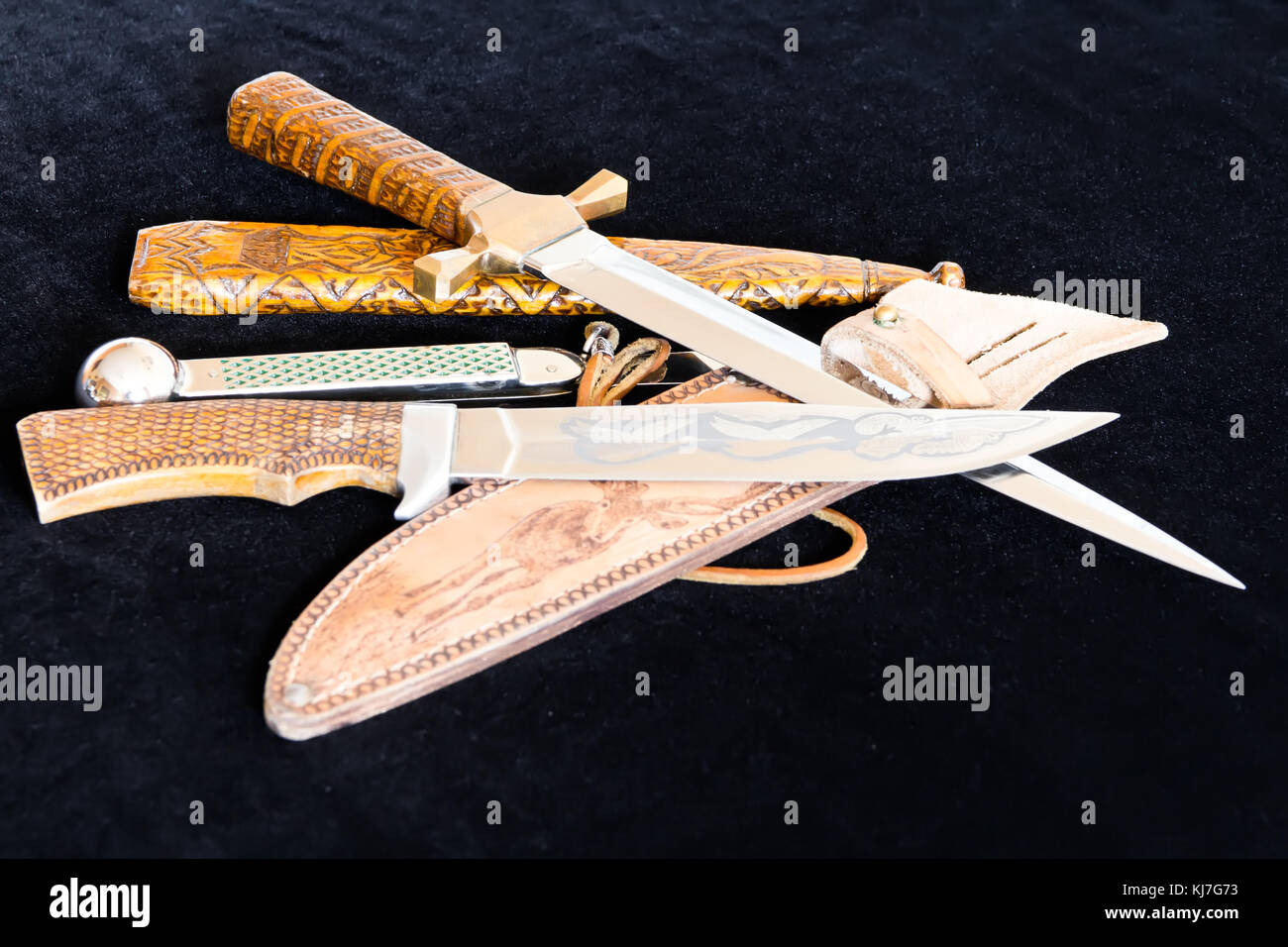 Photo of cold weapon on black background Stock Photo - Alamy