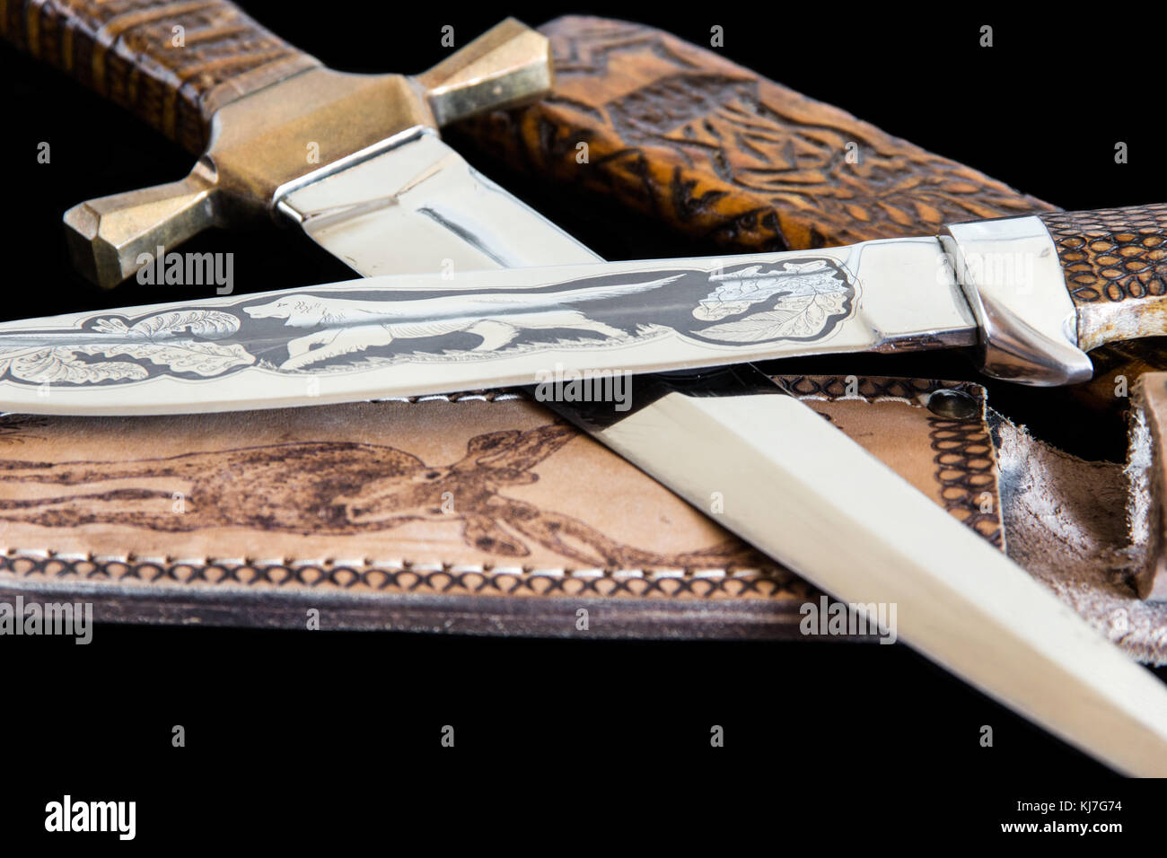 Photo of cold weapon on black background Stock Photo - Alamy