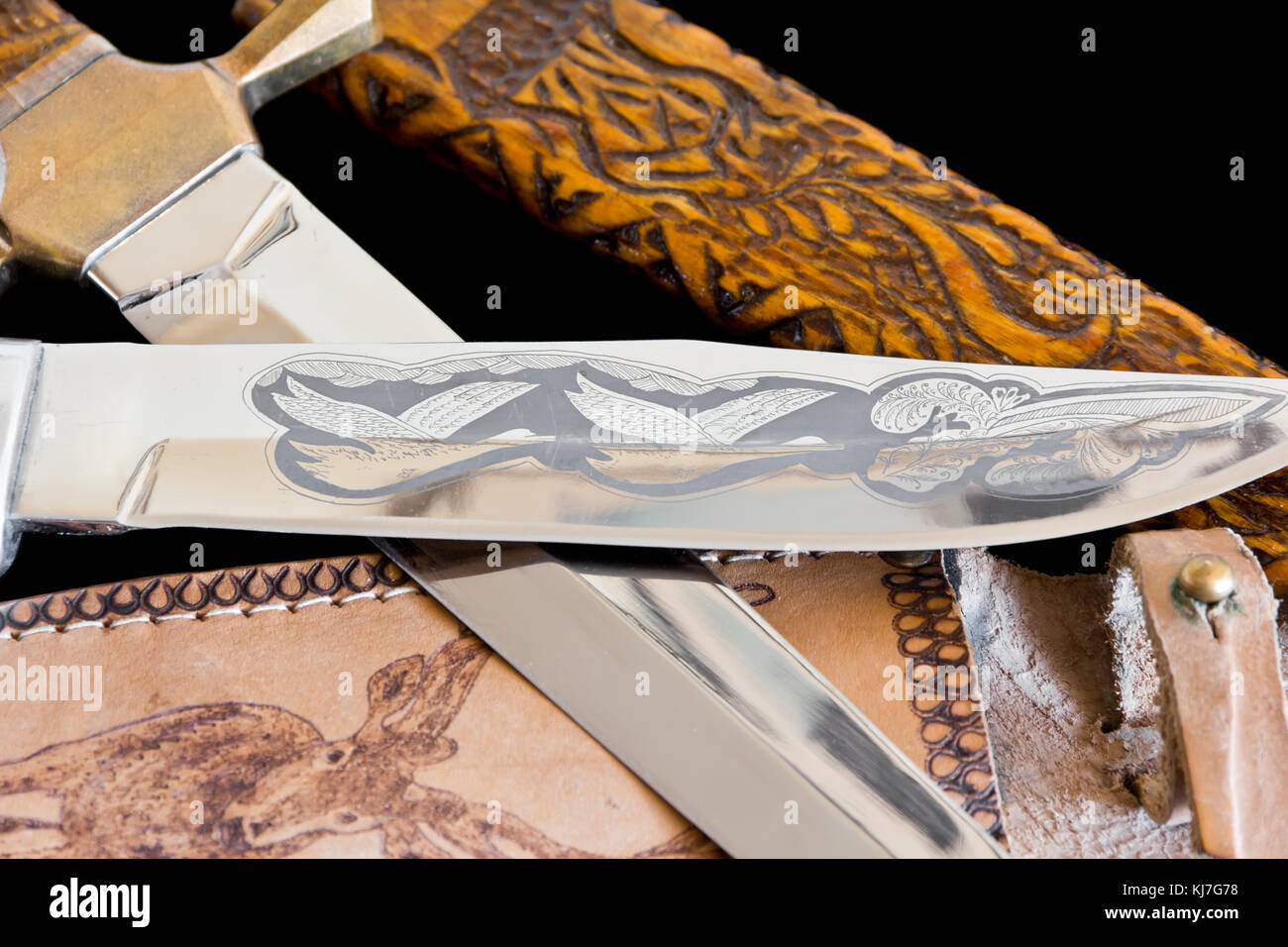 Photo of cold weapon on black background Stock Photo - Alamy