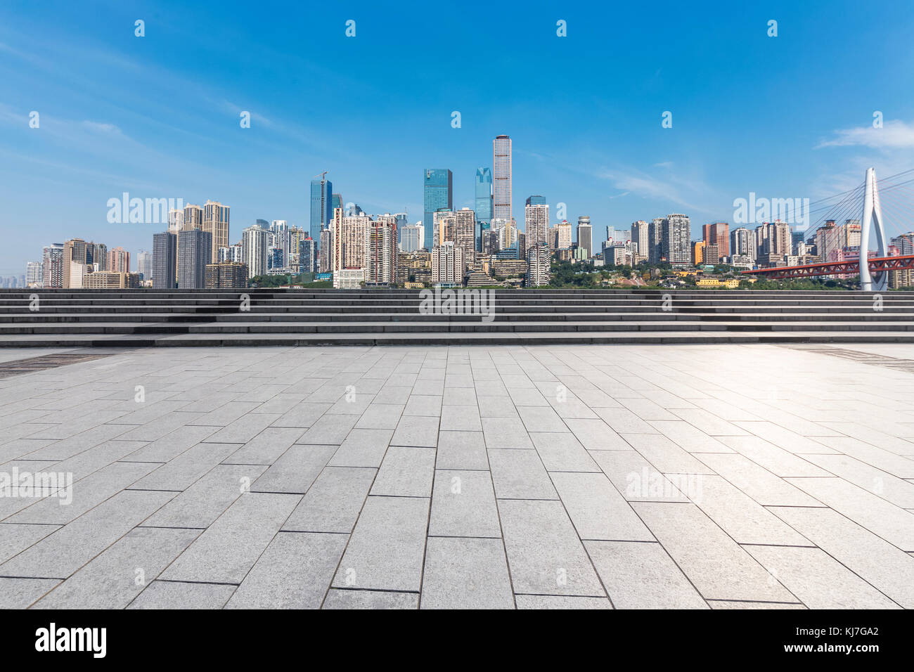Panoramic skyline and buildings with empty concrete square floor ...