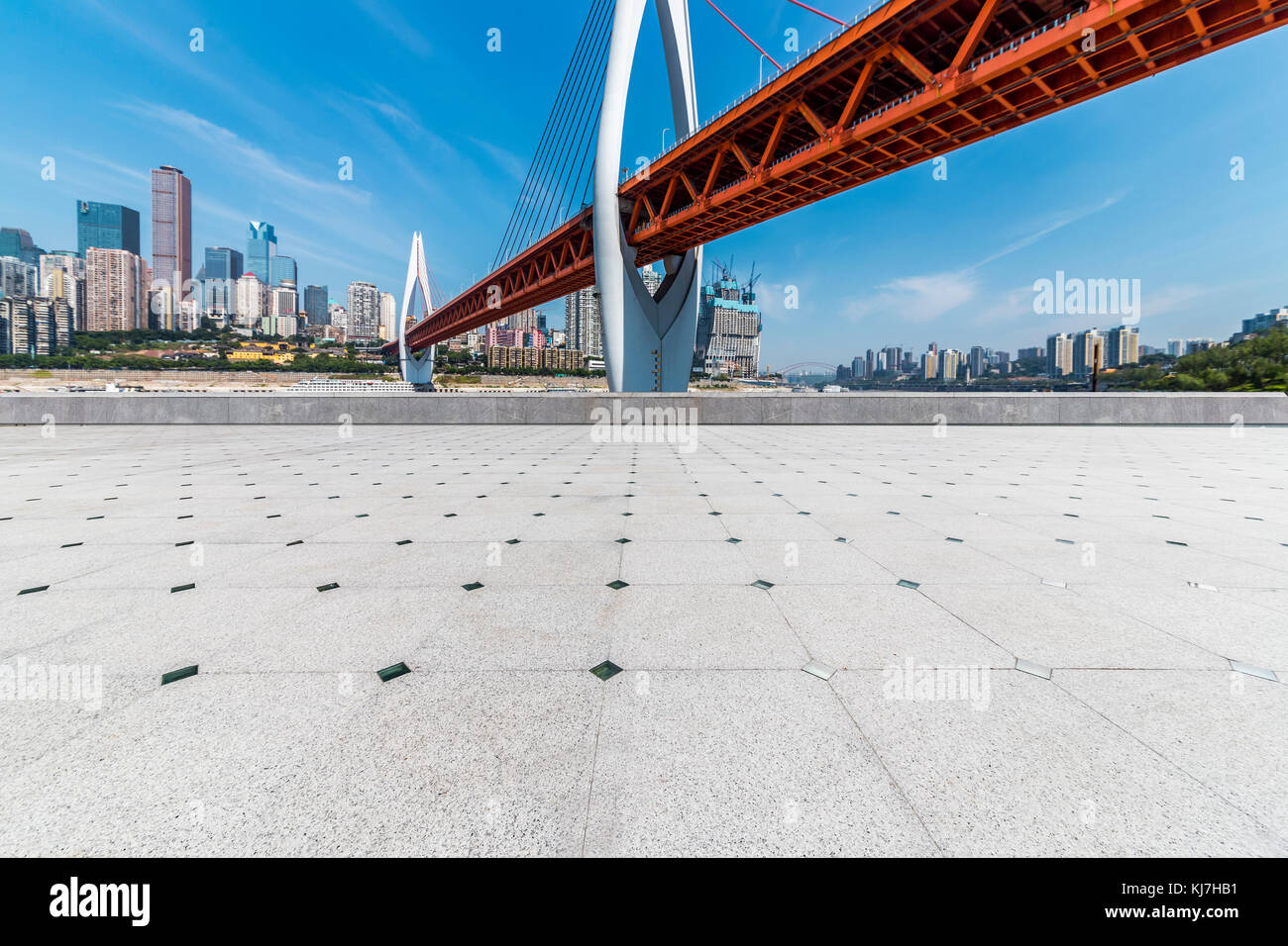 Panoramic skyline and buildings with empty concrete square floor ...