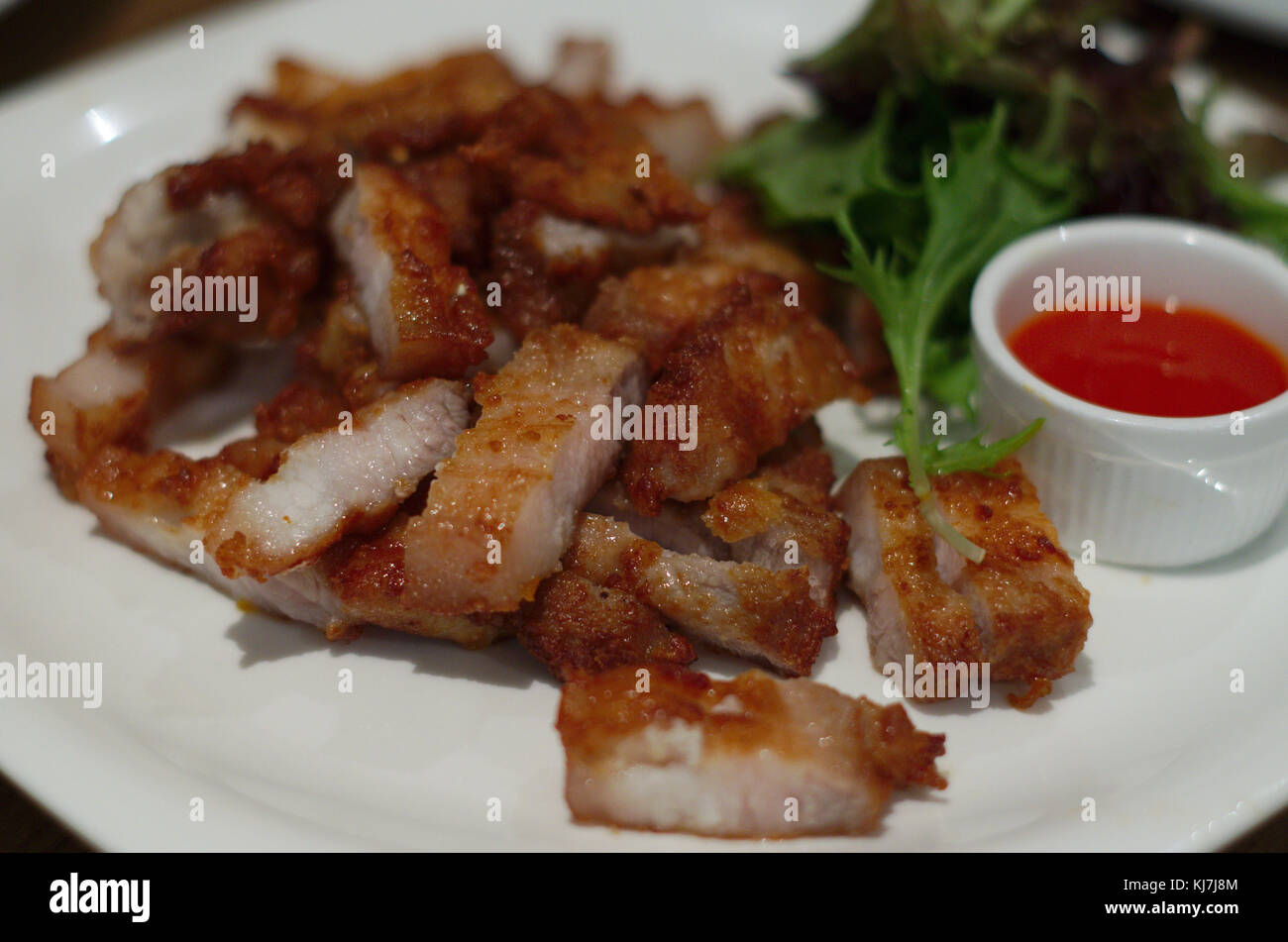 fried pork belly with fish sauce Stock Photo - Alamy