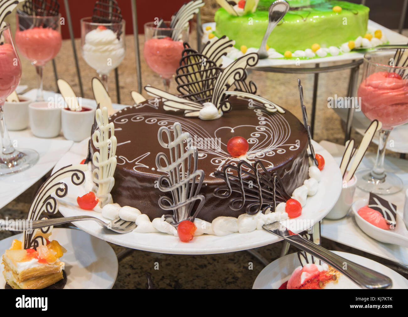 Selection of sweet desserts on display at a luxury restaurant food ...