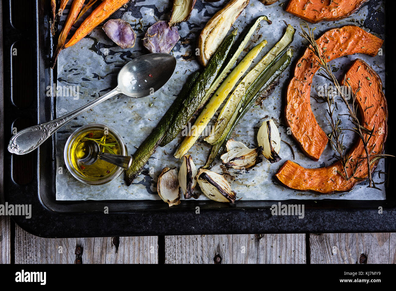 Roasted fresh vegetables on baking sheet. Top view Stock Photo - Alamy