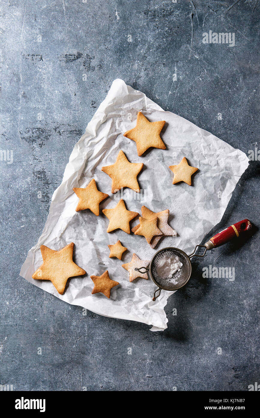 Homemade shortbread star shape sugar cookies different size with sugar ...
