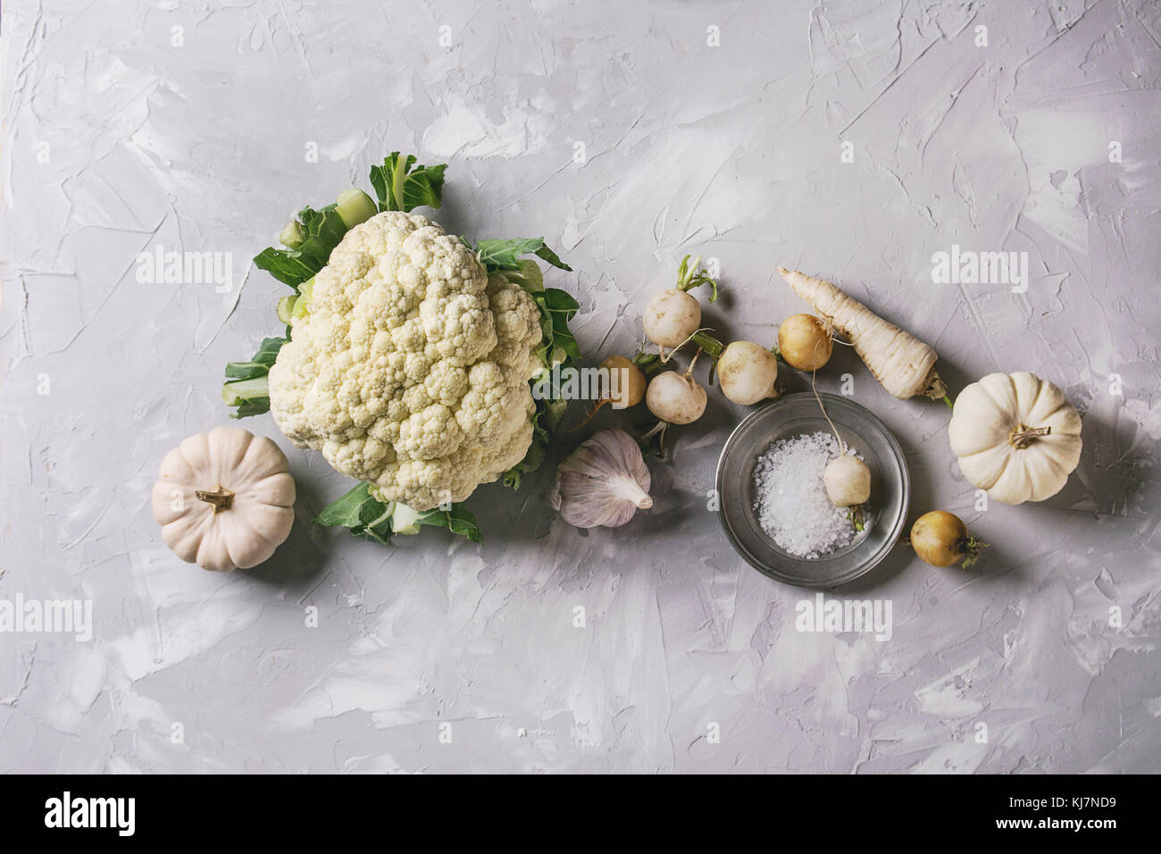 Variety of white vegetables raw organic cauliflower, pumpkins, garlic ...
