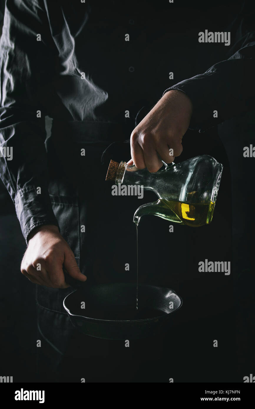 Man pouring cooking oil frying hi-res stock photography and images - Alamy