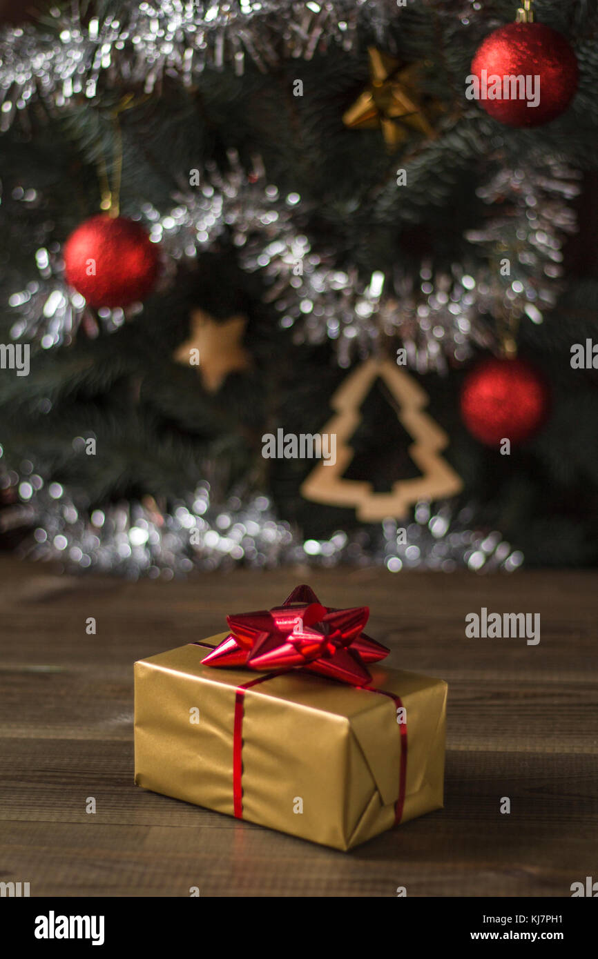 christmas gift under christmas tree Stock Photo - Alamy