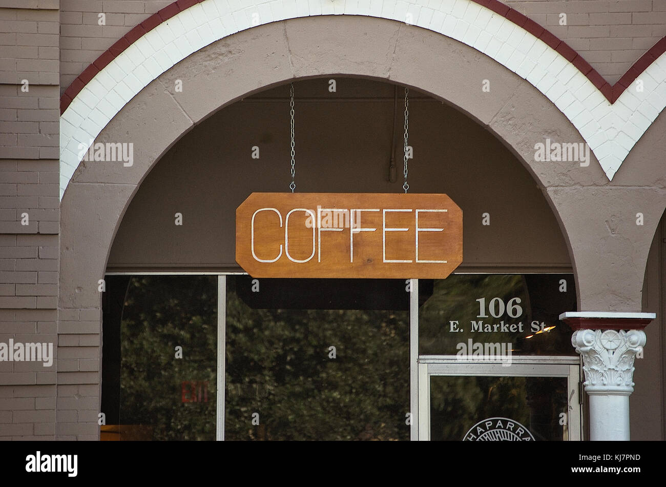 COFFEE sign hanging in front of a coffee business Stock Photo - Alamy