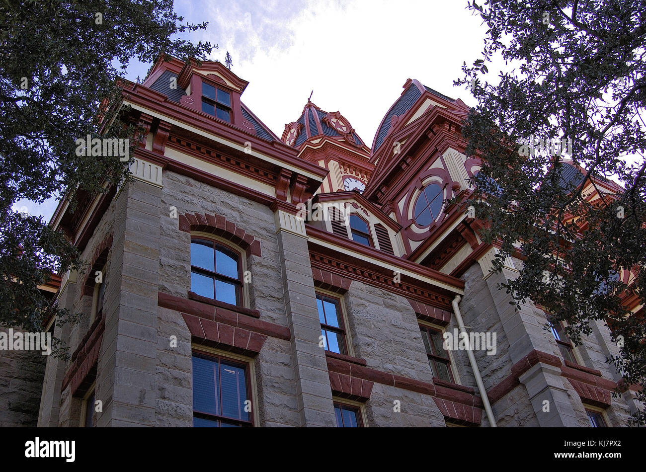 Courthouse official government building with clock and rock walls Stock ...