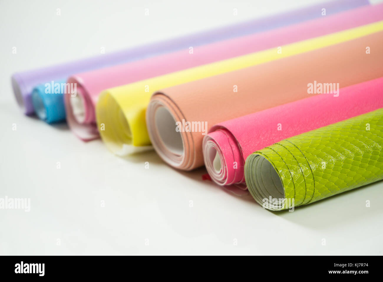 Different colors of leather rolls for artwork and craft Stock Photo - Alamy