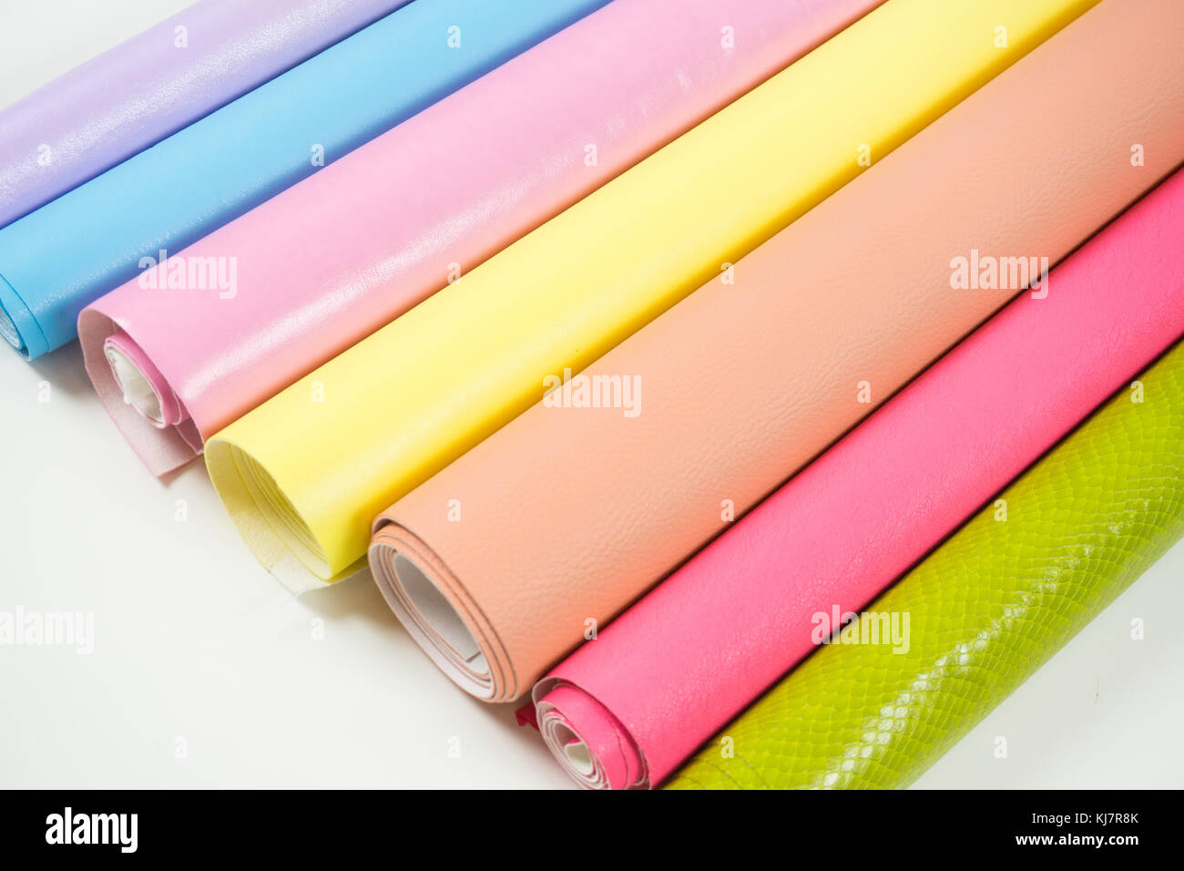 Different colors of leather rolls for artwork and craft Stock Photo - Alamy