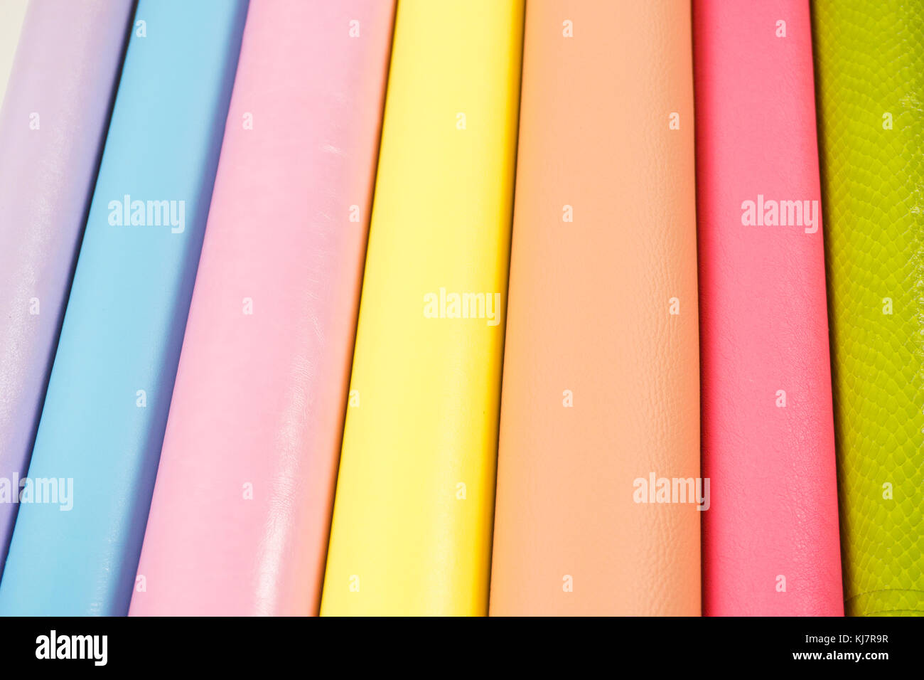 Different colors of leather rolls for artwork and craft Stock Photo - Alamy