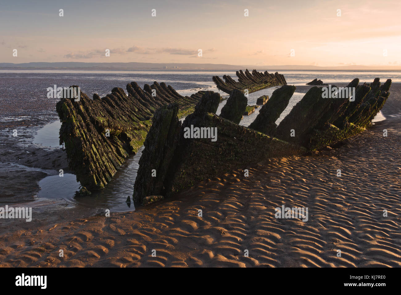 Sunset picture of the exposed wreck of the wooden Norwegian barque SS ...
