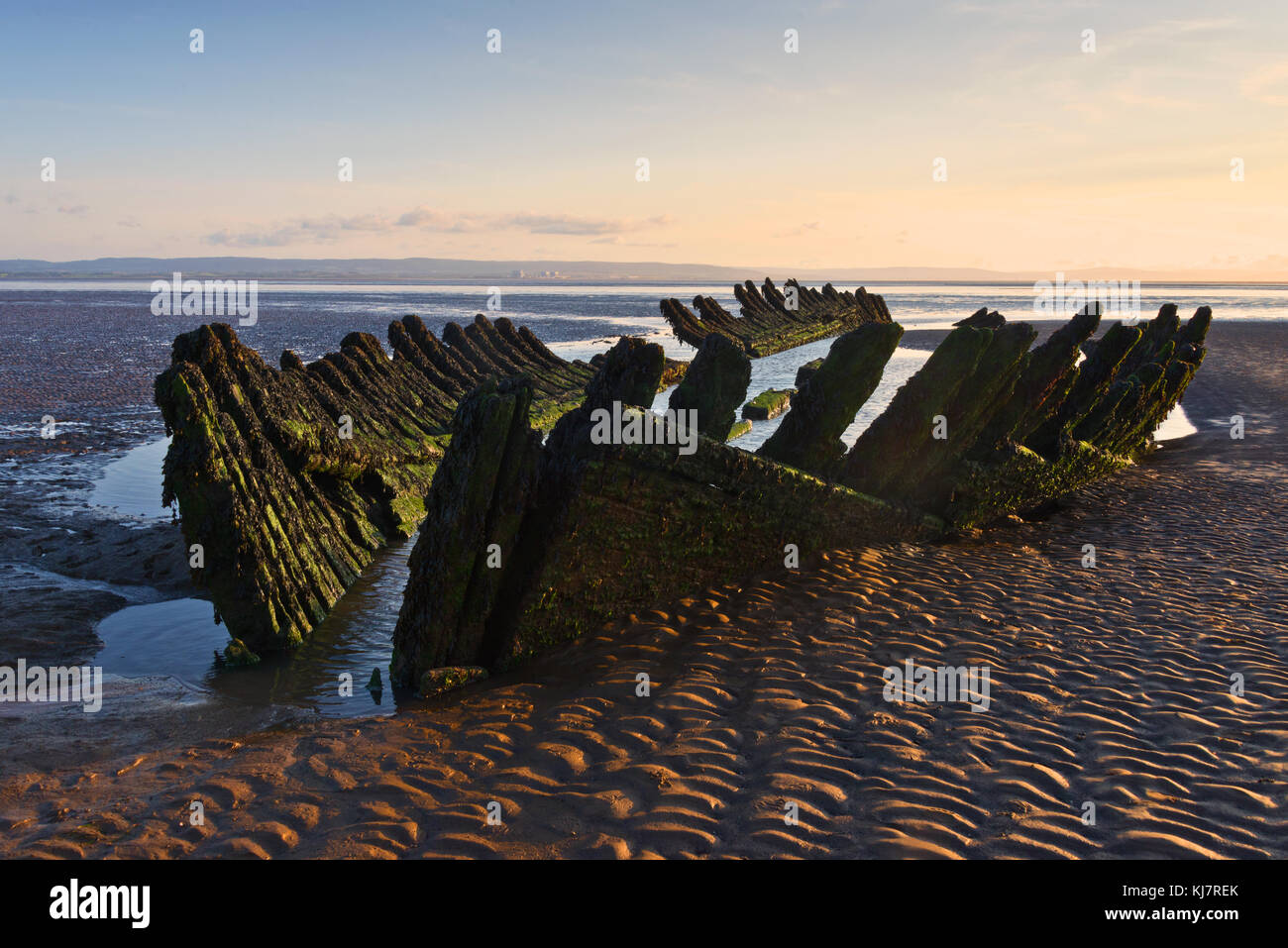 Sunset picture of the exposed wreck of the wooden Norwegian barque SS ...