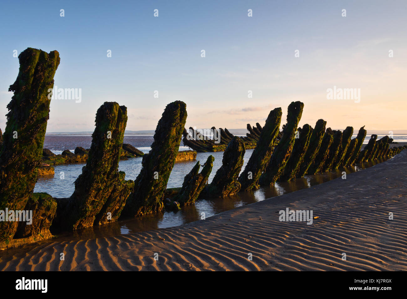 Sunset picture of the exposed wreck of the wooden Norwegian barque SS ...