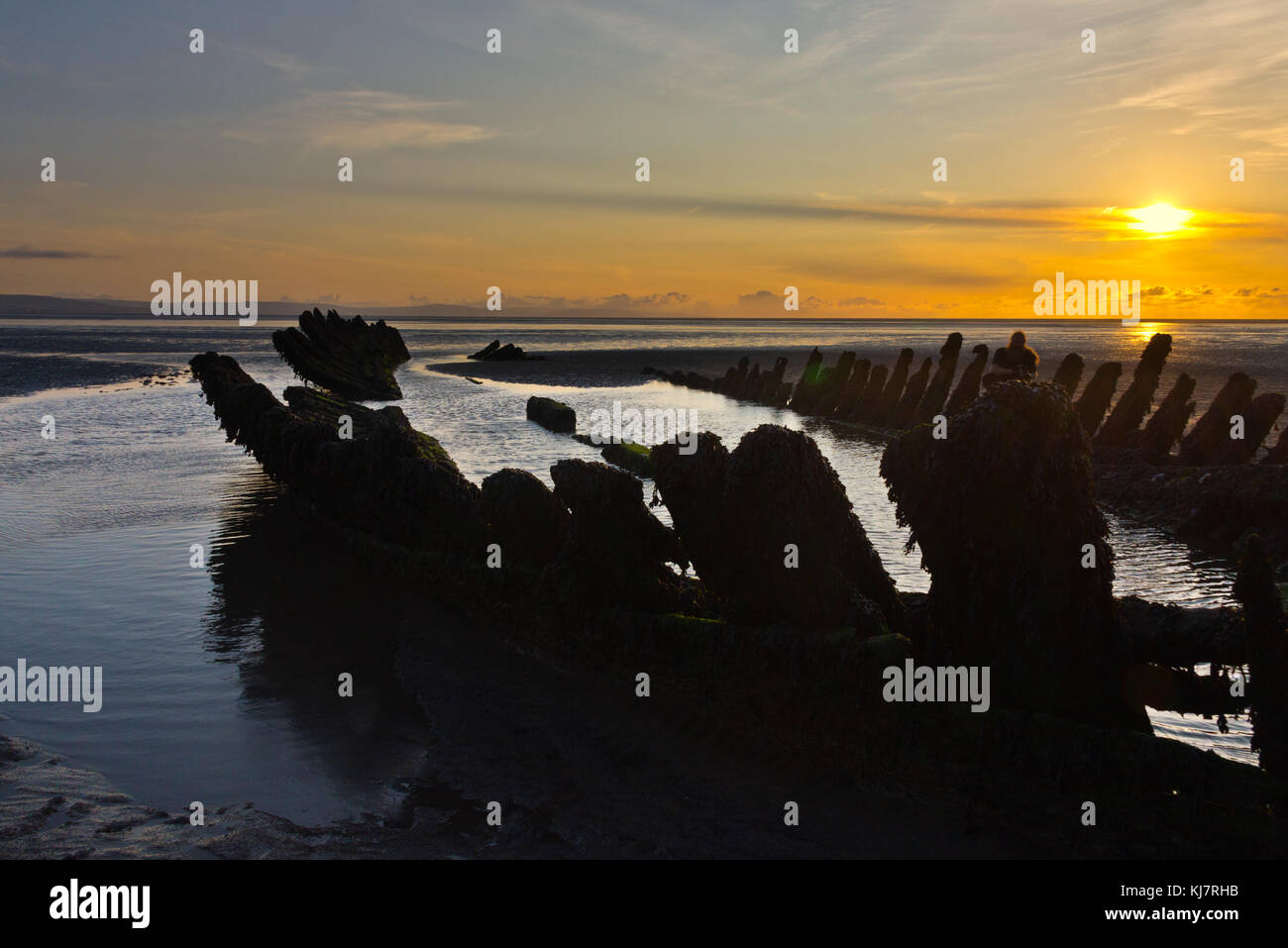 Sunset picture of the exposed wreck of the wooden Norwegian barque SS ...