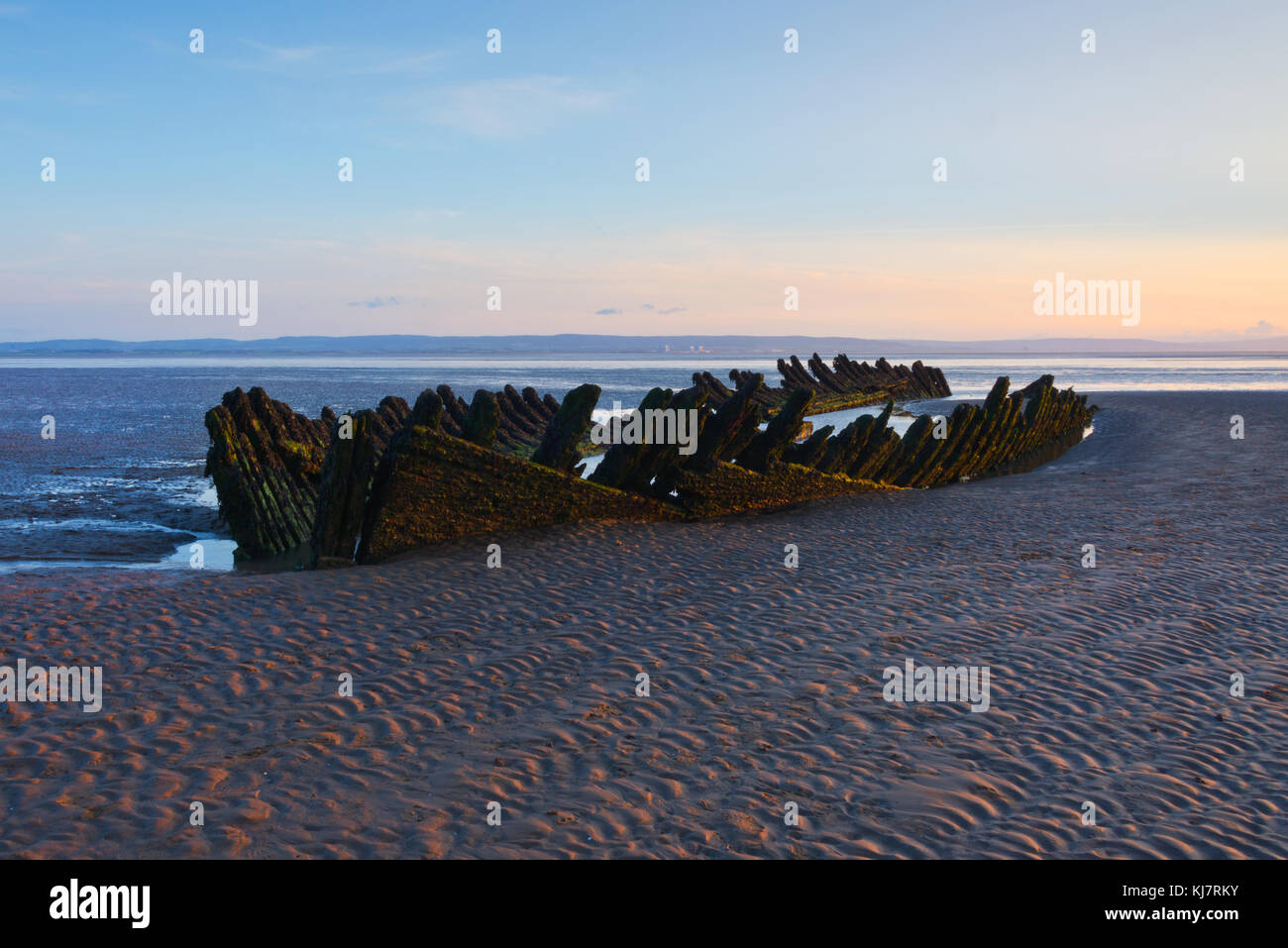 Sunset picture of the exposed wreck of the wooden Norwegian barque SS ...