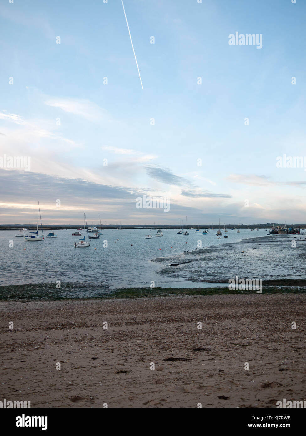 marina harbour landscape beach ocean sky with moored boats; west mersea ...