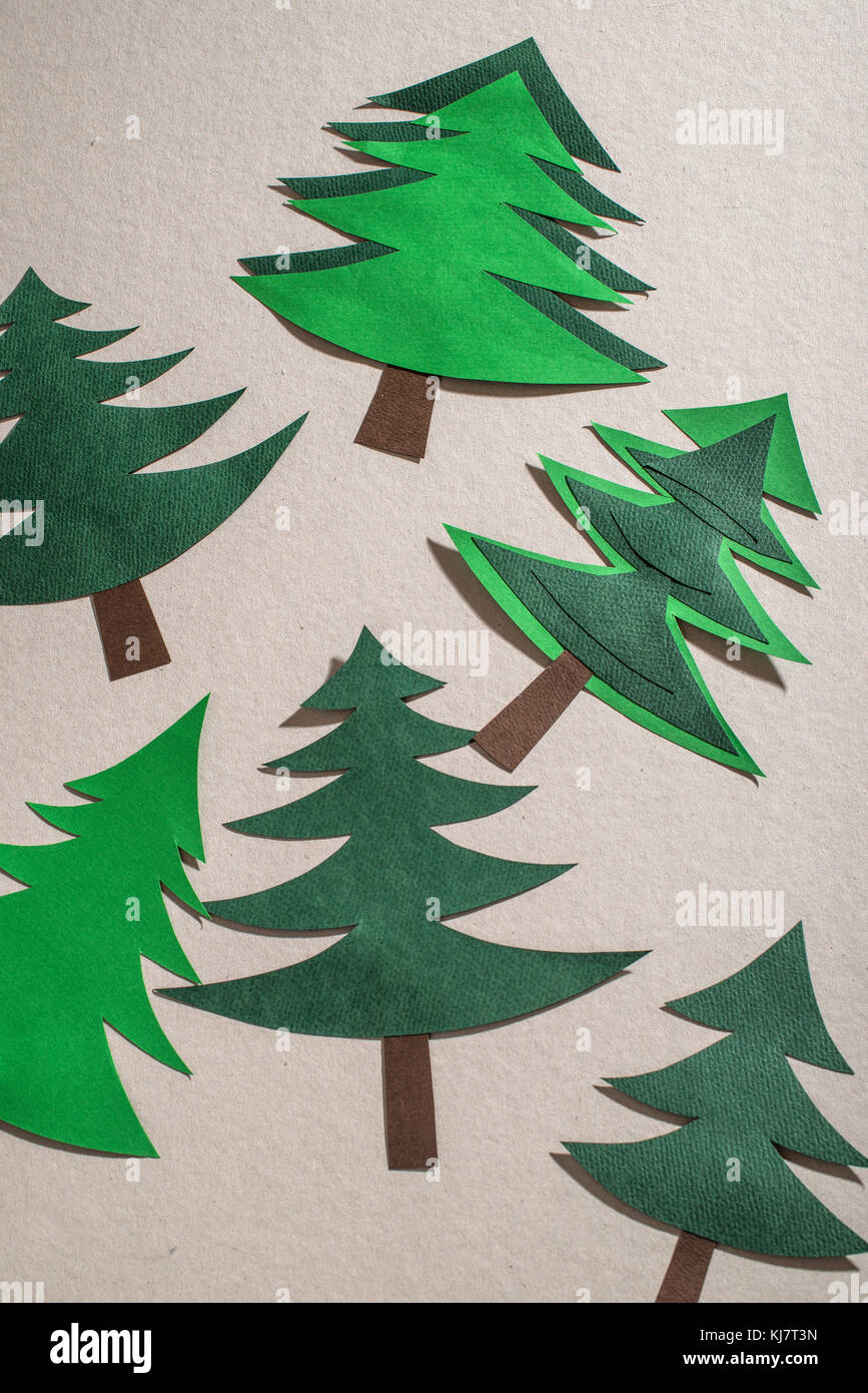 Christmas pine tree made of paper on paper background. Origami ...