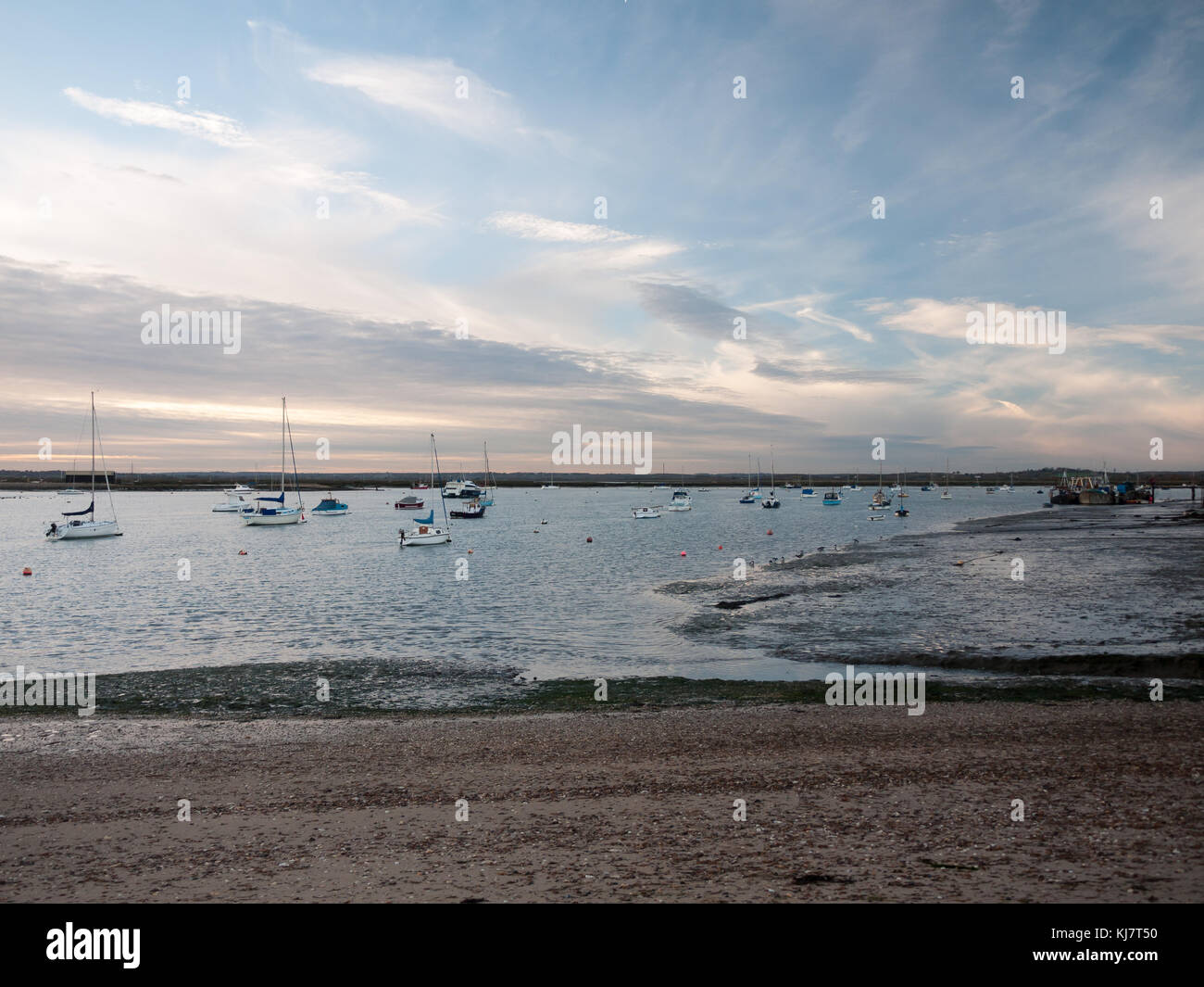 marina harbour landscape beach ocean sky with moored boats; west mersea ...