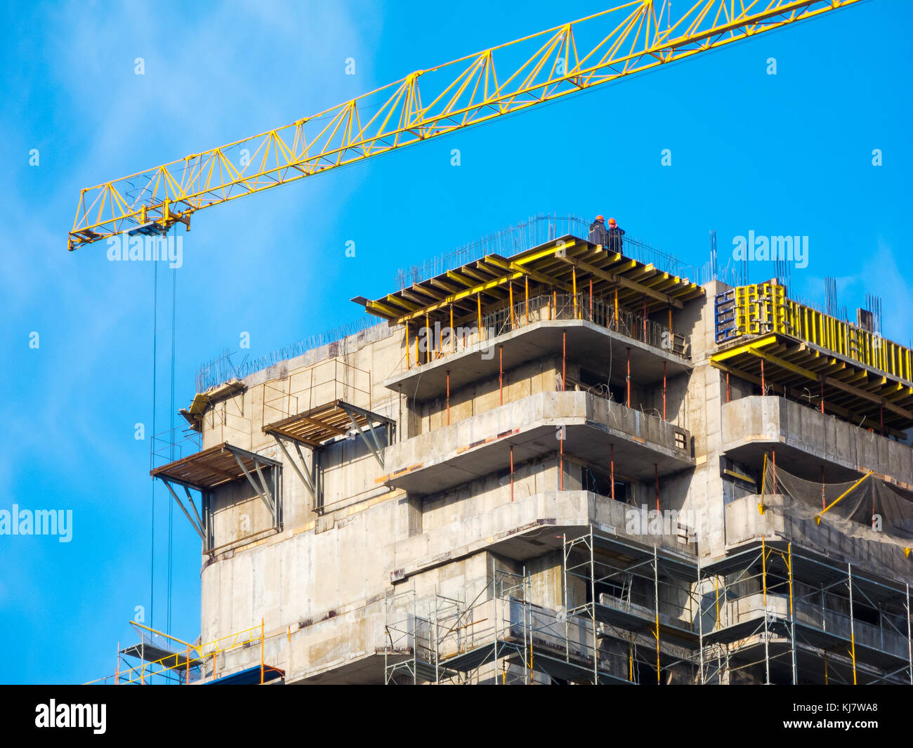 Multi level building construction site Stock Photo - Alamy