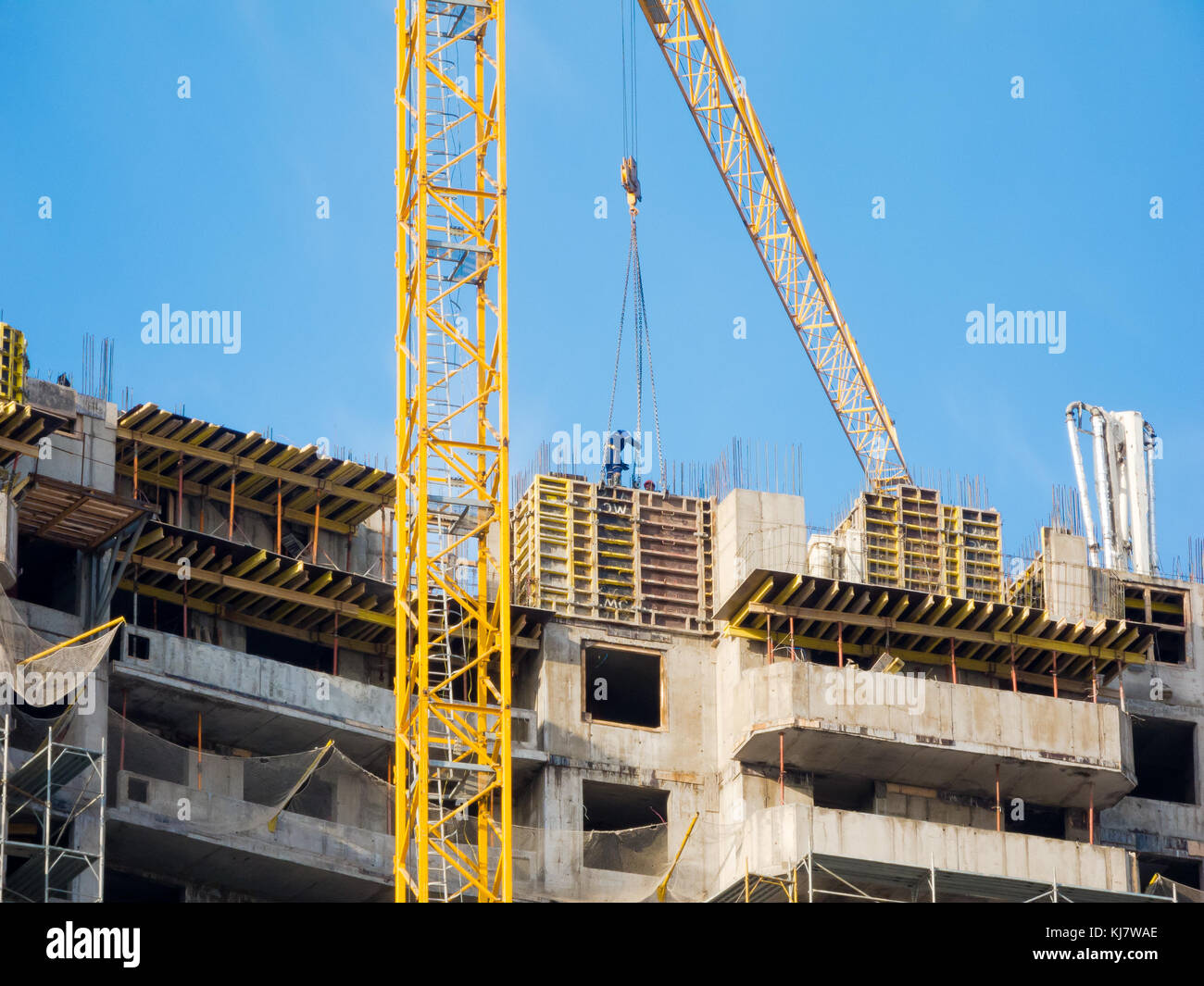 Multi level building construction site Stock Photo - Alamy