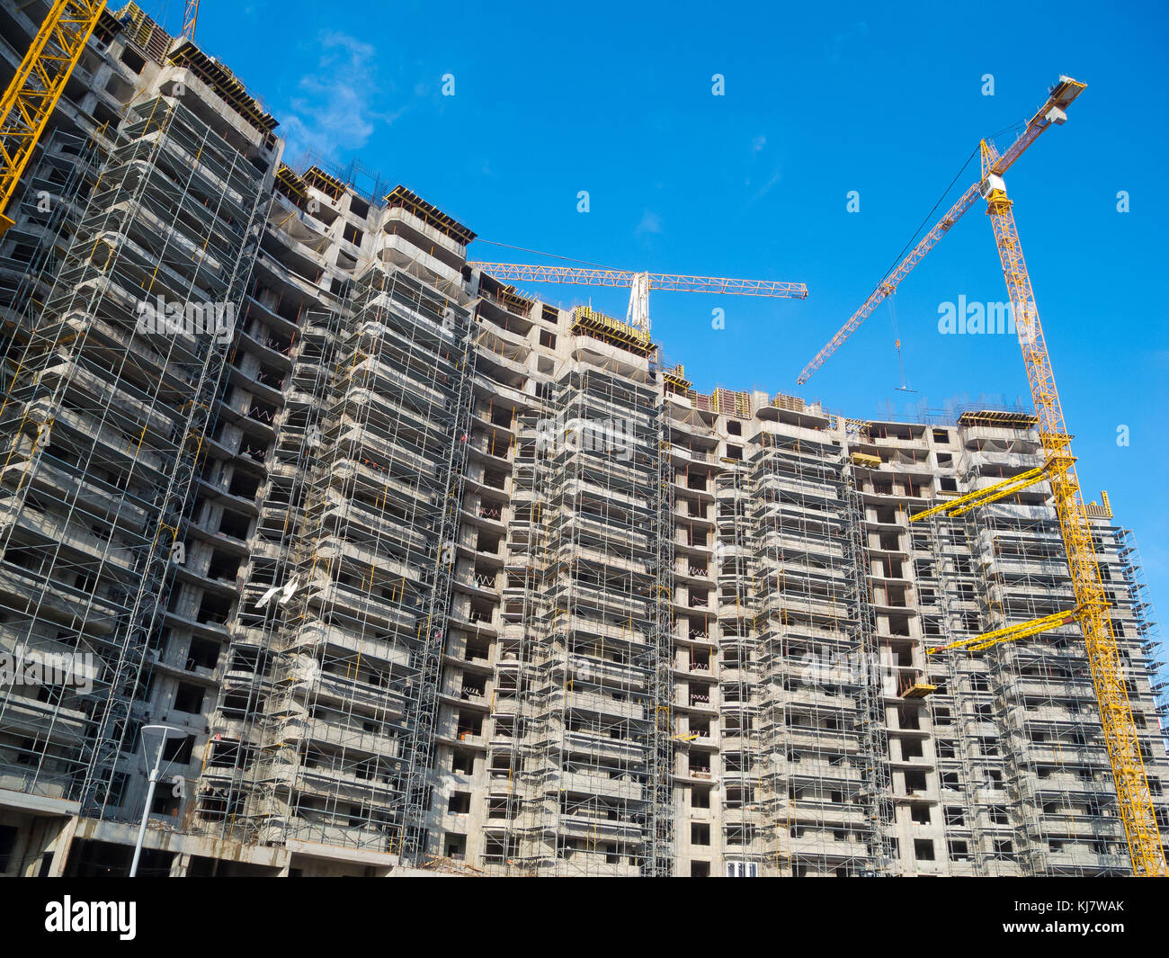 Multi level building construction site Stock Photo - Alamy
