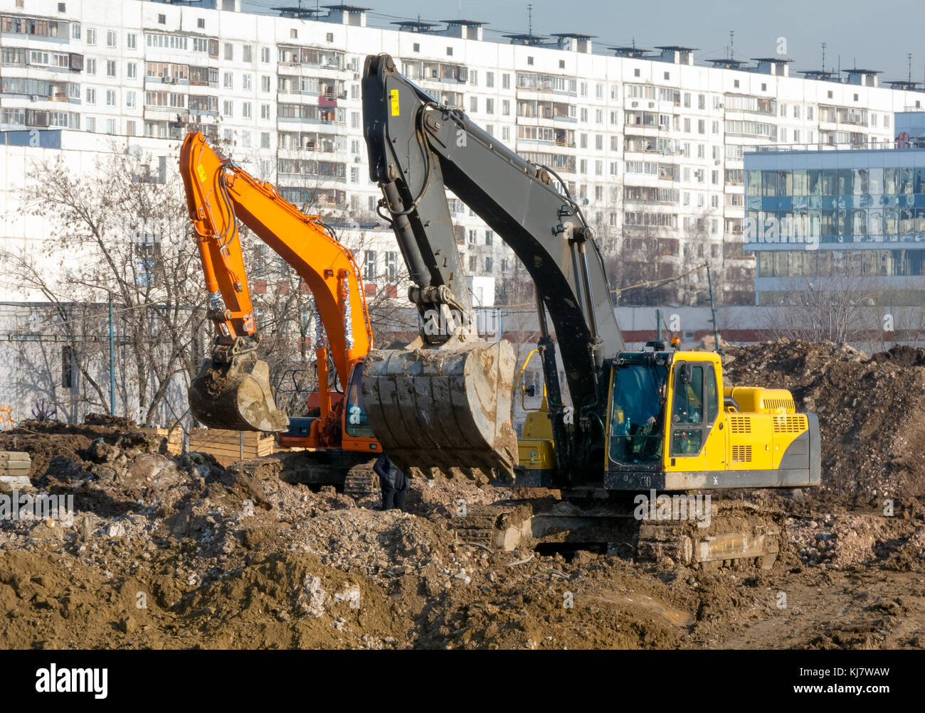 Excavators dig hi-res stock photography and images - Alamy
