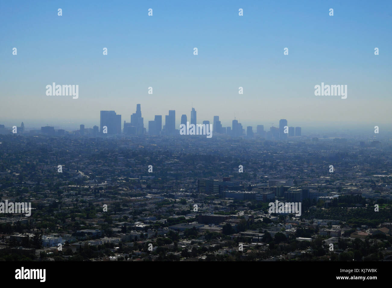 Skyline view of downtown Los Angeles smog & buildings over Los Feliz ...