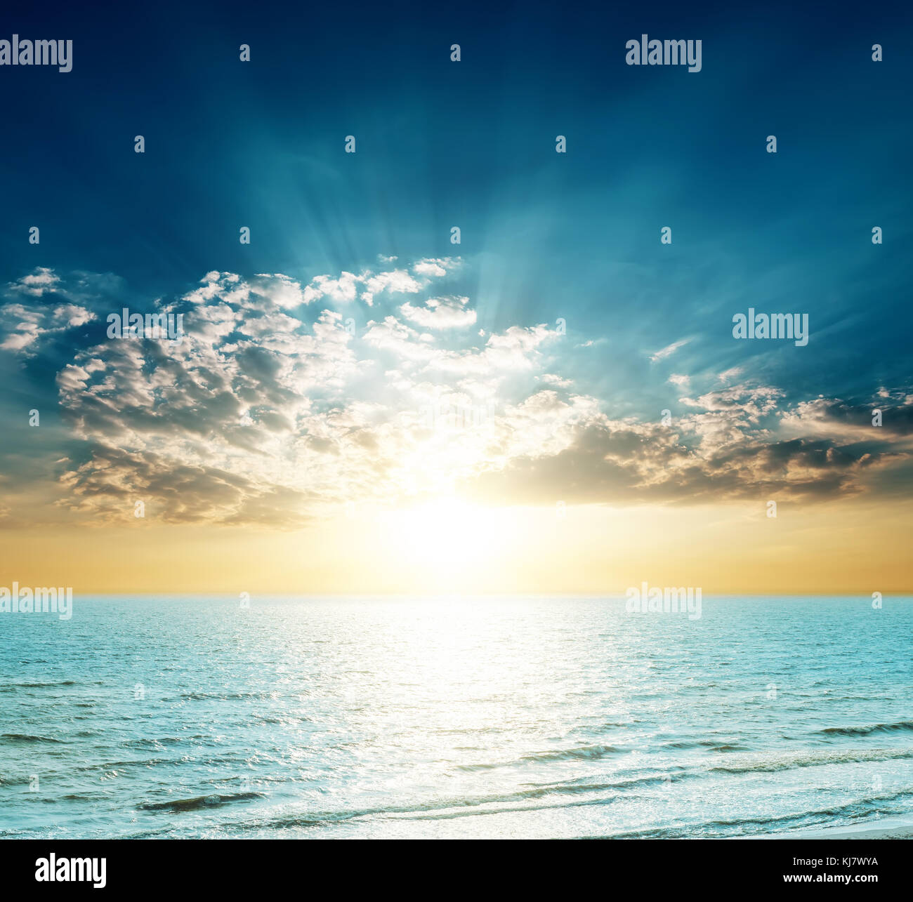 good sunset over blue sea Stock Photo - Alamy