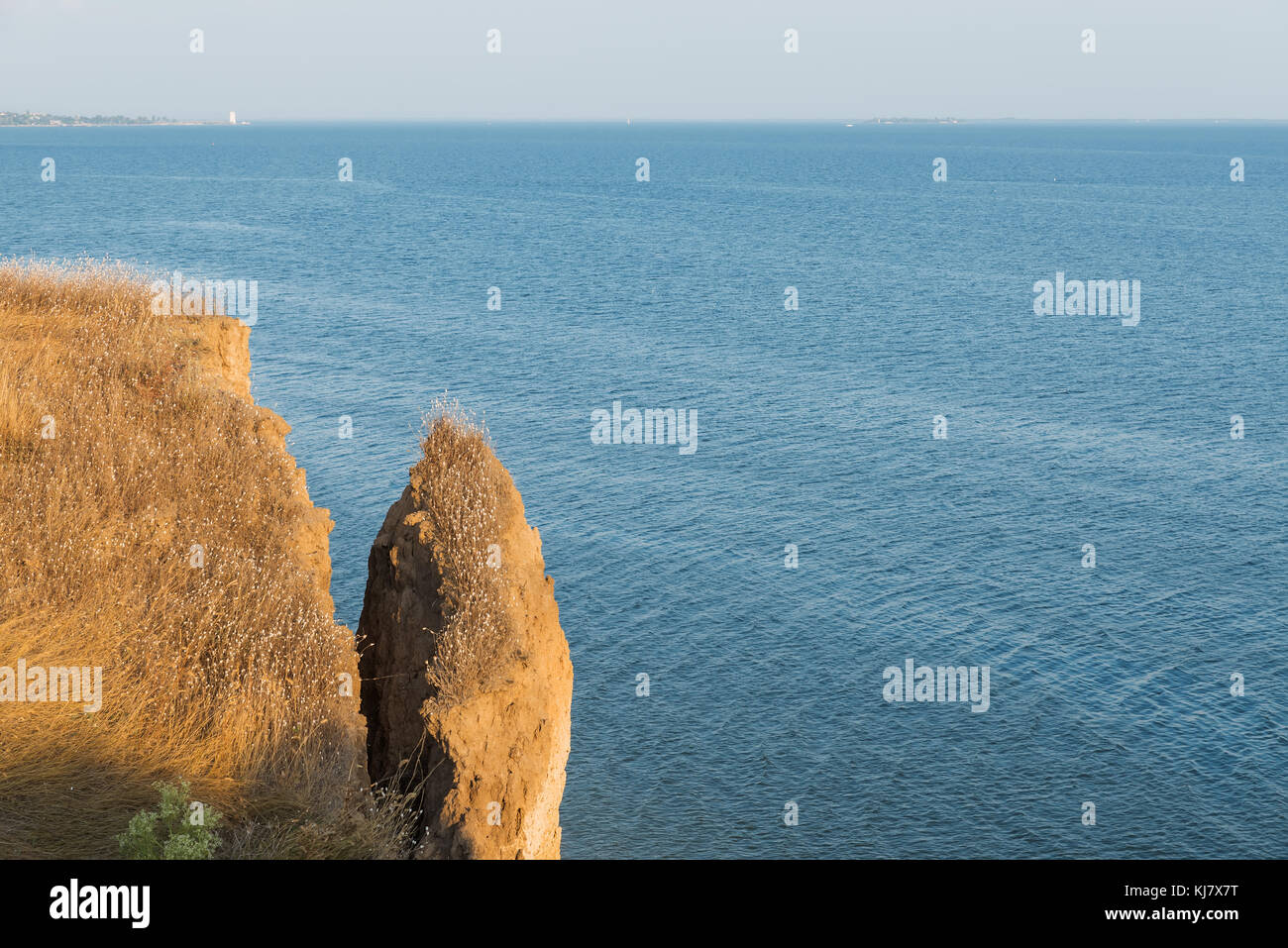 Cliff over the sea. Soil erosion Stock Photo - Alamy
