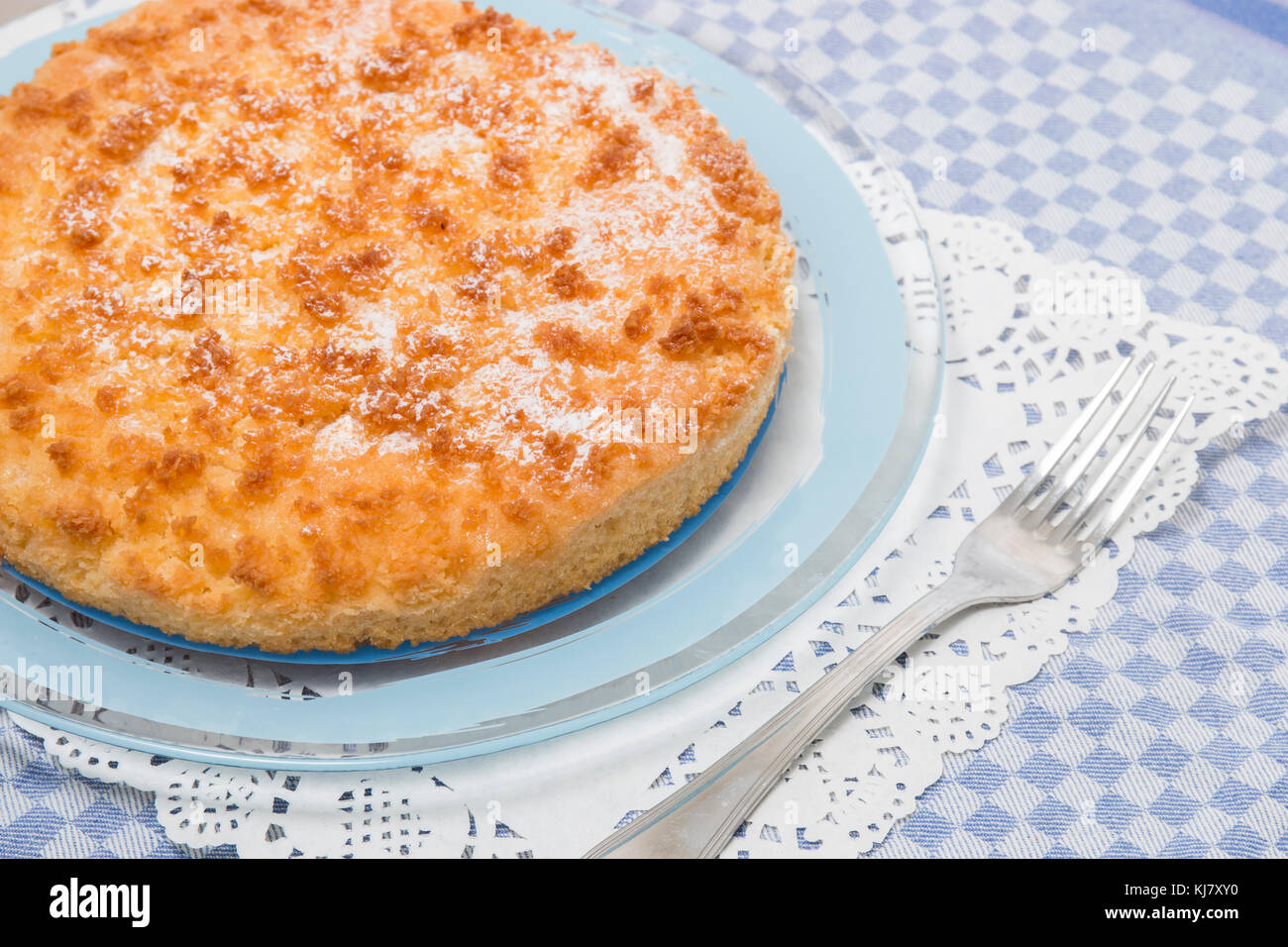 Close up view of a tasty coconut crumble cake Stock Photo - Alamy