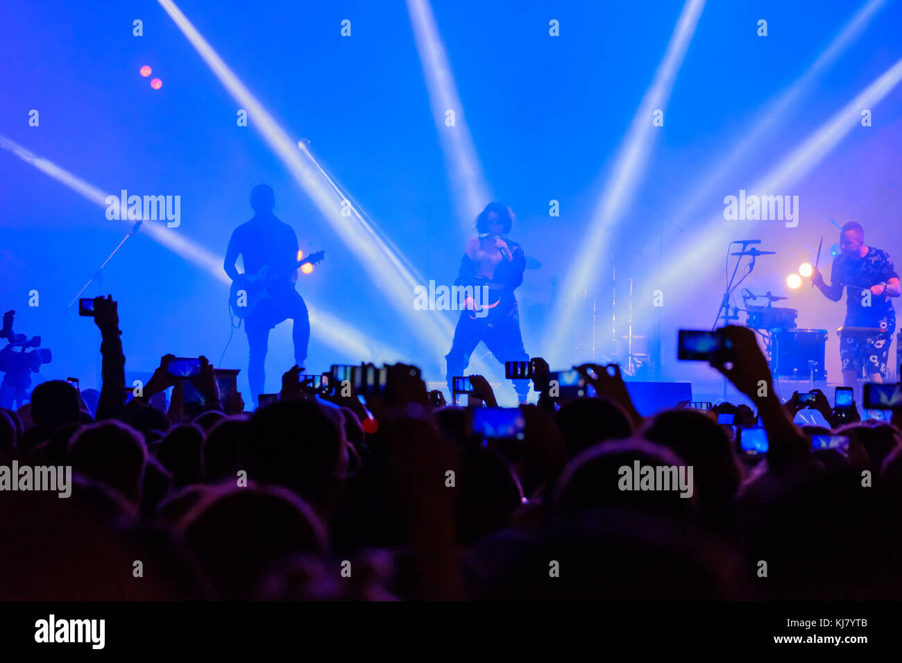 Group performing at live concert Stock Photo - Alamy