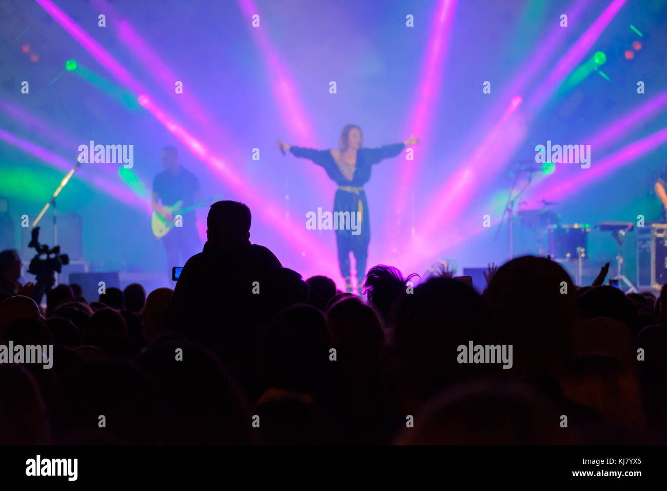 Group performing at live concert Stock Photo - Alamy