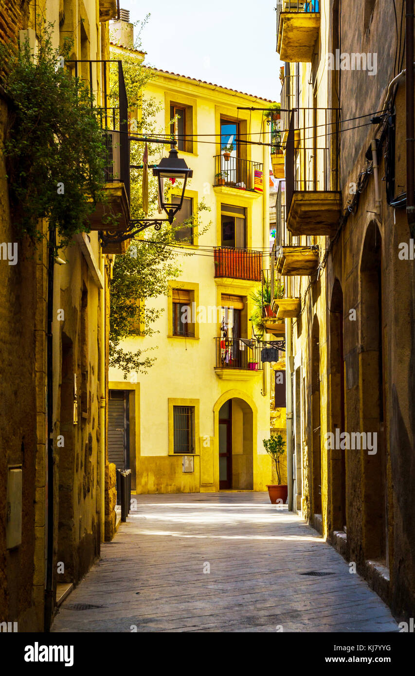charming narrow street, street with colorful facades of buildings ...