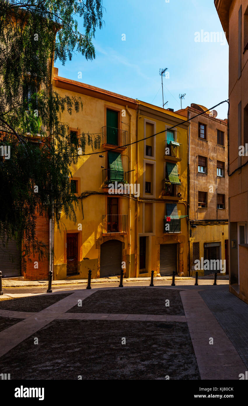 charming narrow street, street with colorful facades of buildings ...