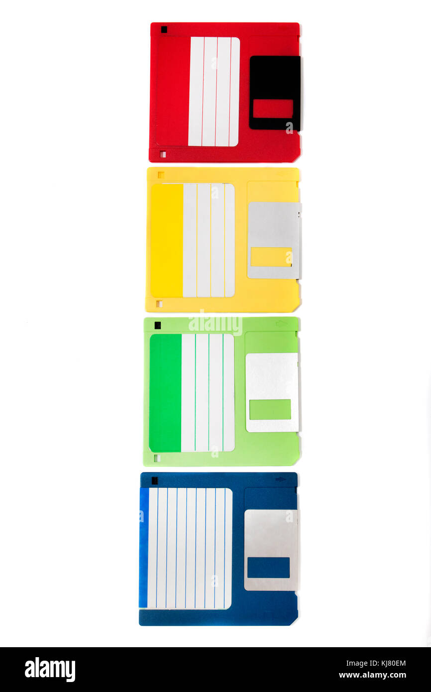 colorful computer floppy disks on a composition isolated on a white ...