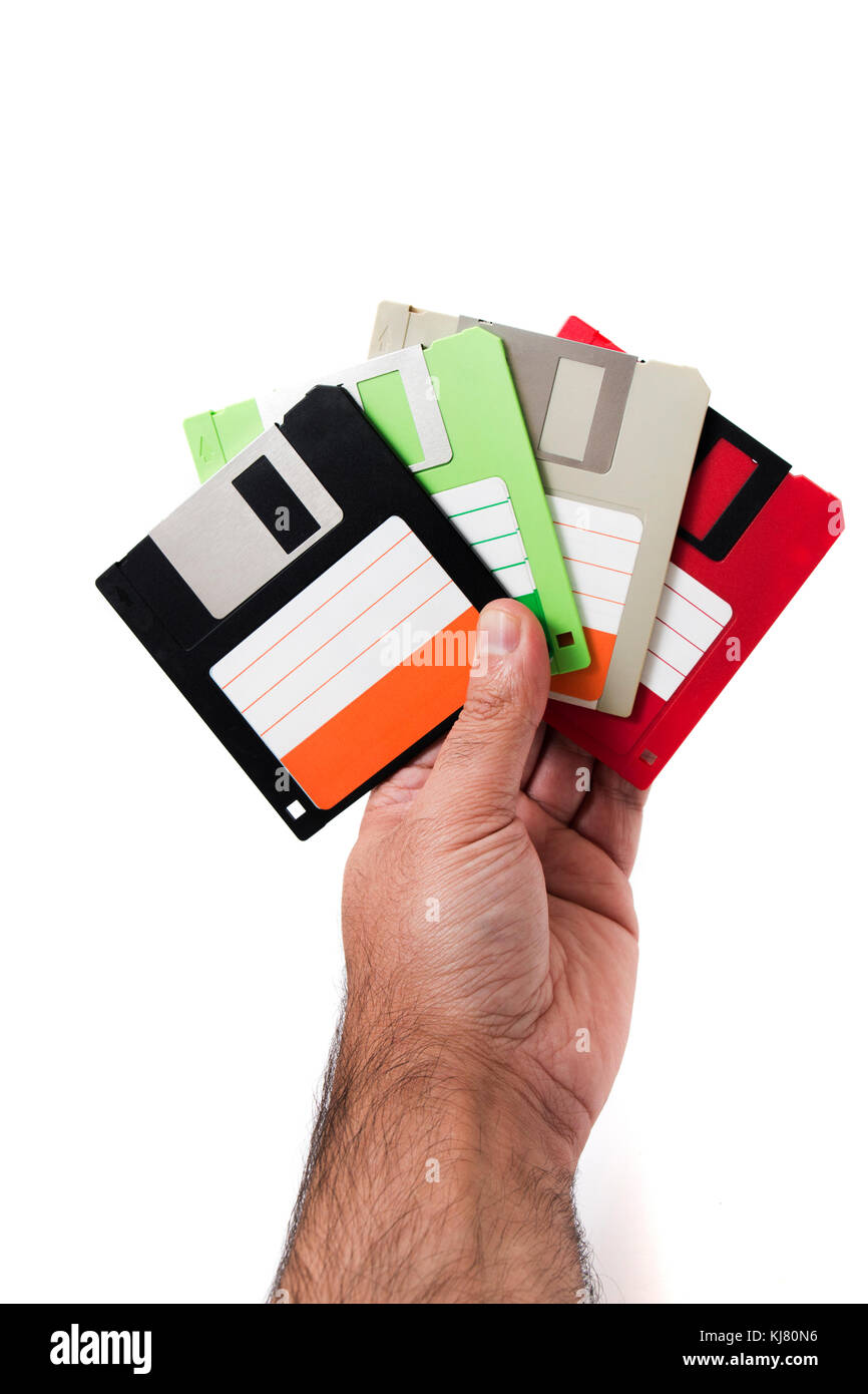 hand with floppy disks isolated on a white background Stock Photo - Alamy