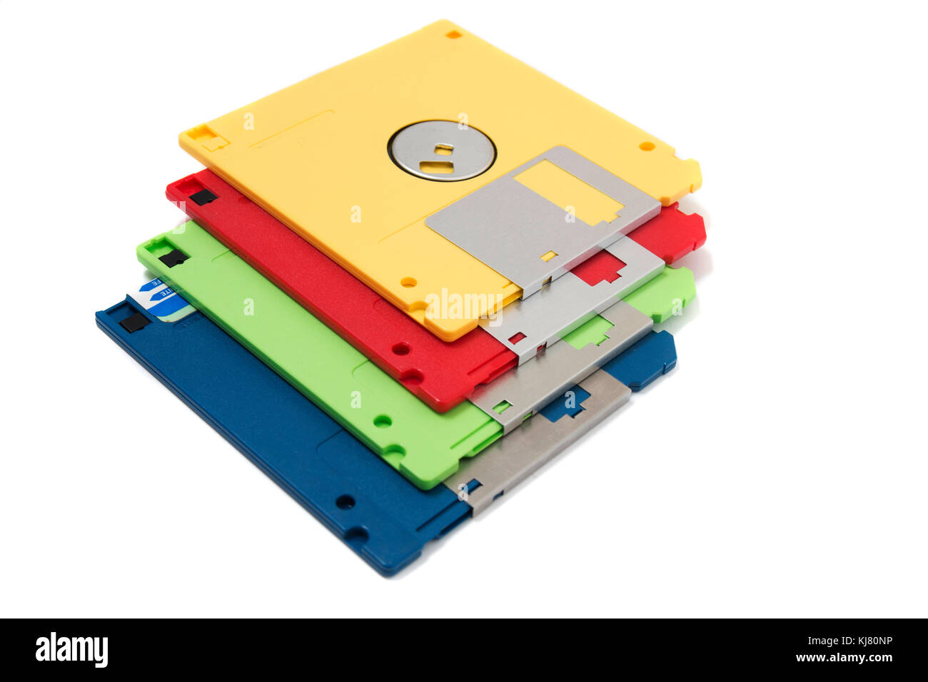 Pile of colorful computer floppy disks isolated on a white background ...