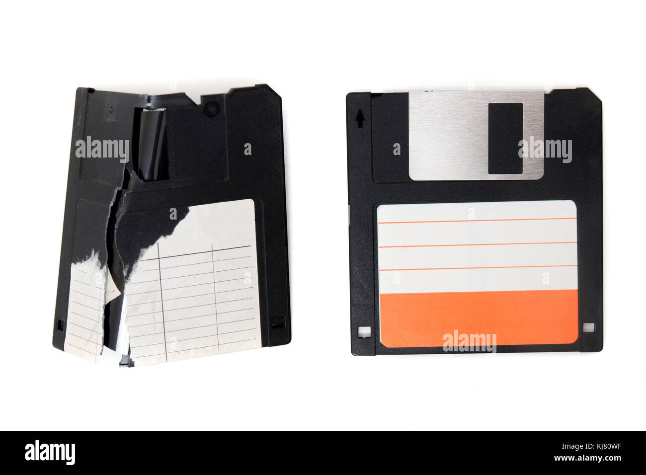 computer floppy disks, one broken and a new one, isolated on a white ...