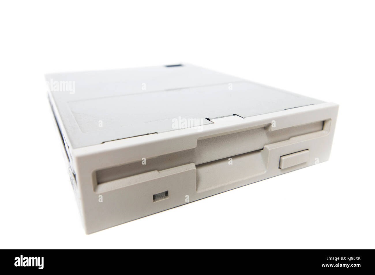 Closeup view of a computer floppy drive, isolated on a white background ...