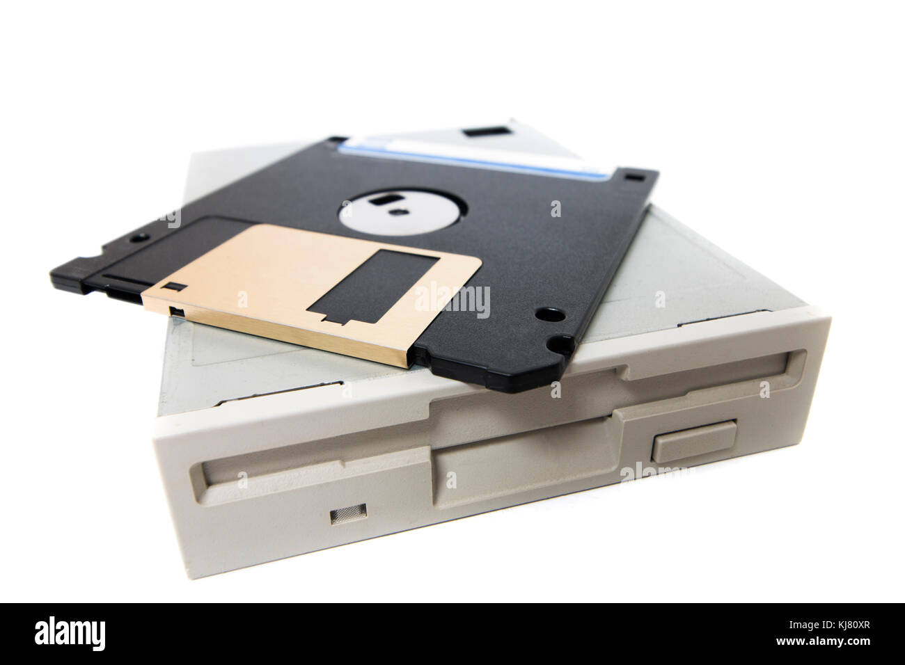 Closeup view of a computer floppy drive, isolated on a white background ...