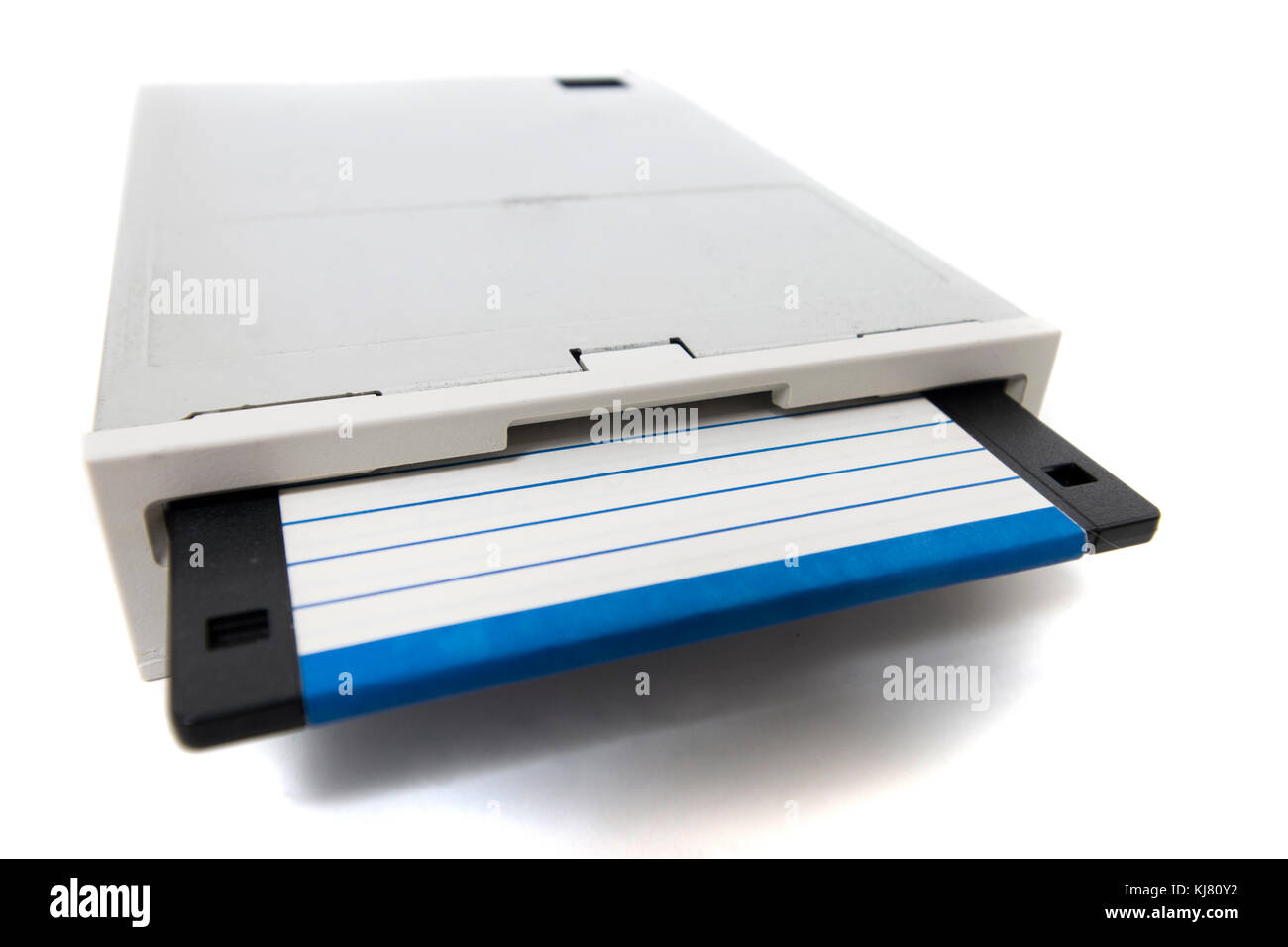 Closeup view of a computer floppy drive, isolated on a white background ...
