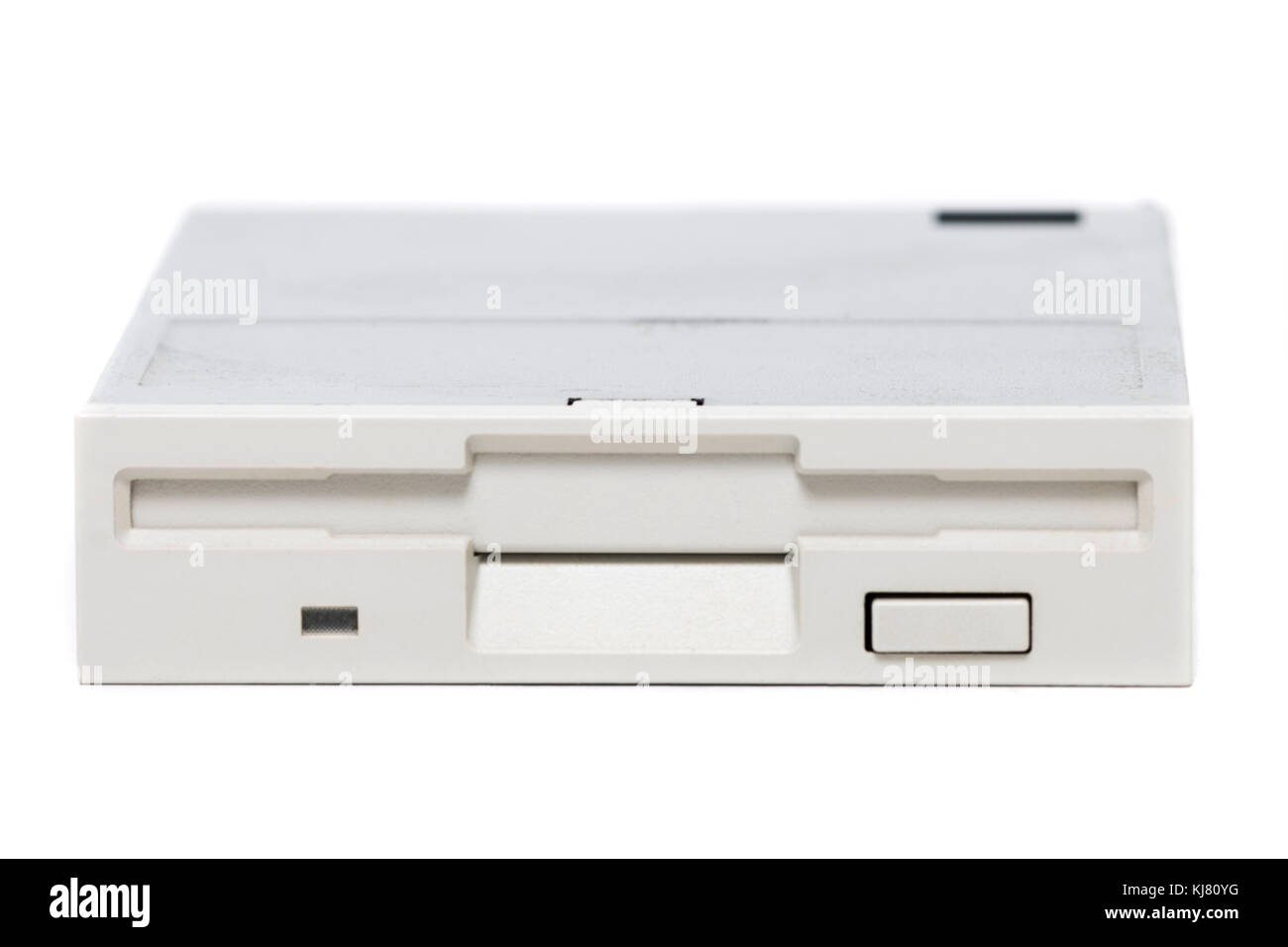 Closeup view of a computer floppy drive, isolated on a white background ...