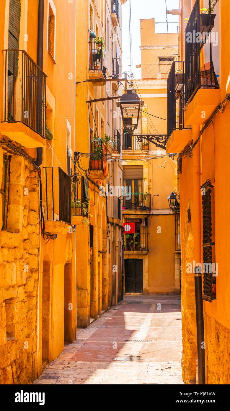 charming narrow street, street with colorful facades of buildings ...