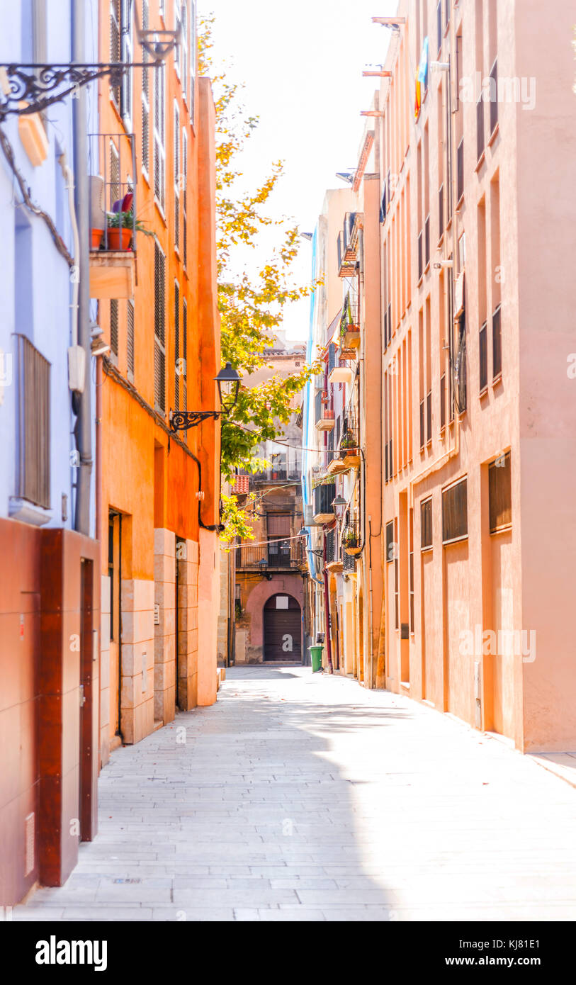charming narrow street, street with colorful facades of buildings ...